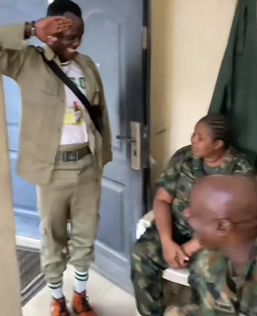 Heart melting moment corper visits parents at workplace with his NYSC ...
